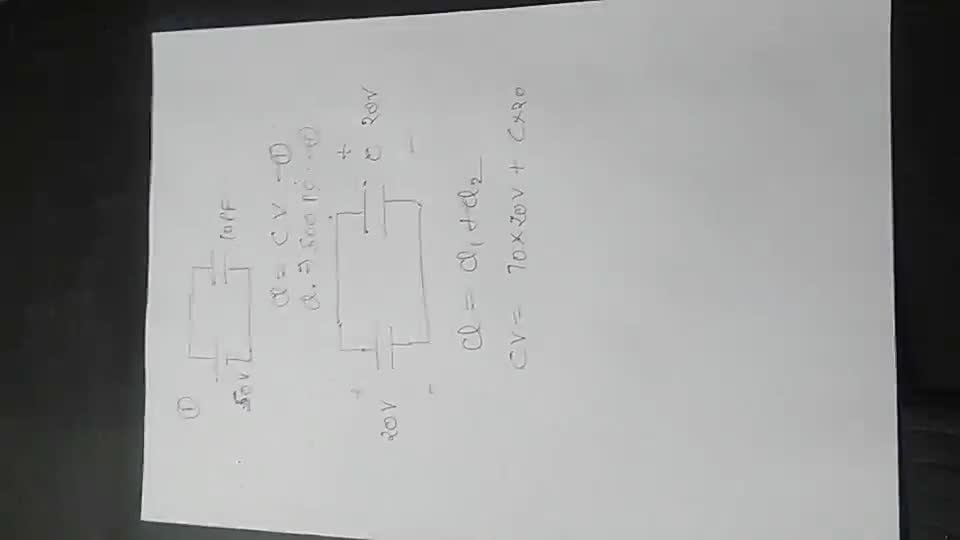 A 10 \mathrm{PF} capacitor is fully charged to a potential difference of