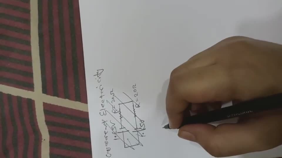 Two identical cell of emf 1.65 \mathrm{~V} are connected in parallel acro..